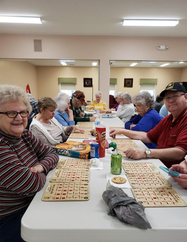 Calling Bingo at Logan Senior Center